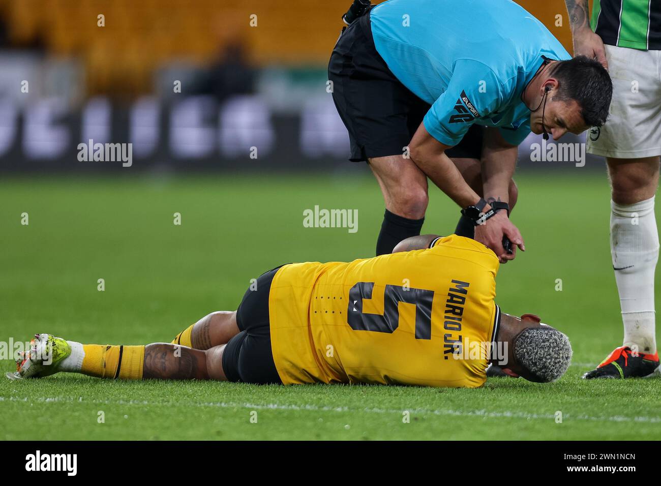 Wolverhampton, UK. 28th Feb, 2024. Referee, Andrew Madley checks on ...