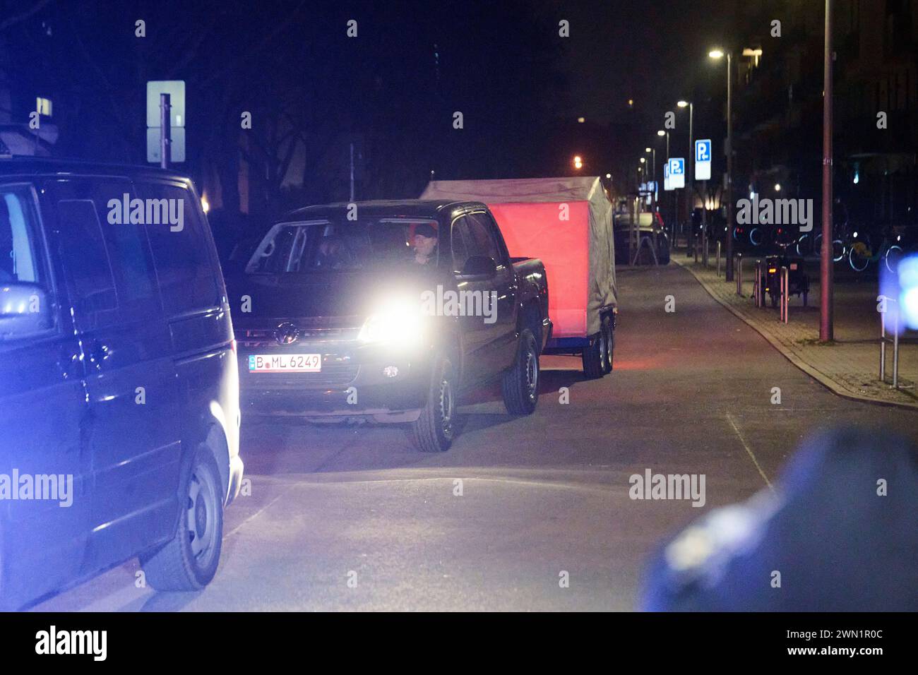 A car with a special trailer containing a dangerous object drives out ...