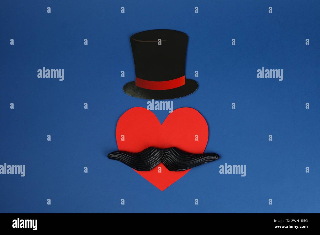 Fake mustache, paper hat and heart on blue background, top view Stock ...
