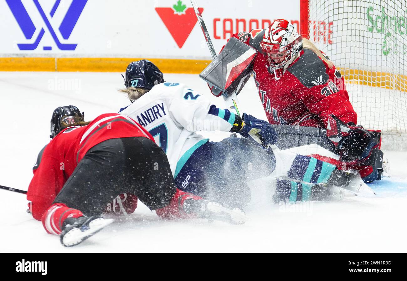 Ottawa's Jincy Roese (71) and New York's Jade Downie-Landry (27) slide ...