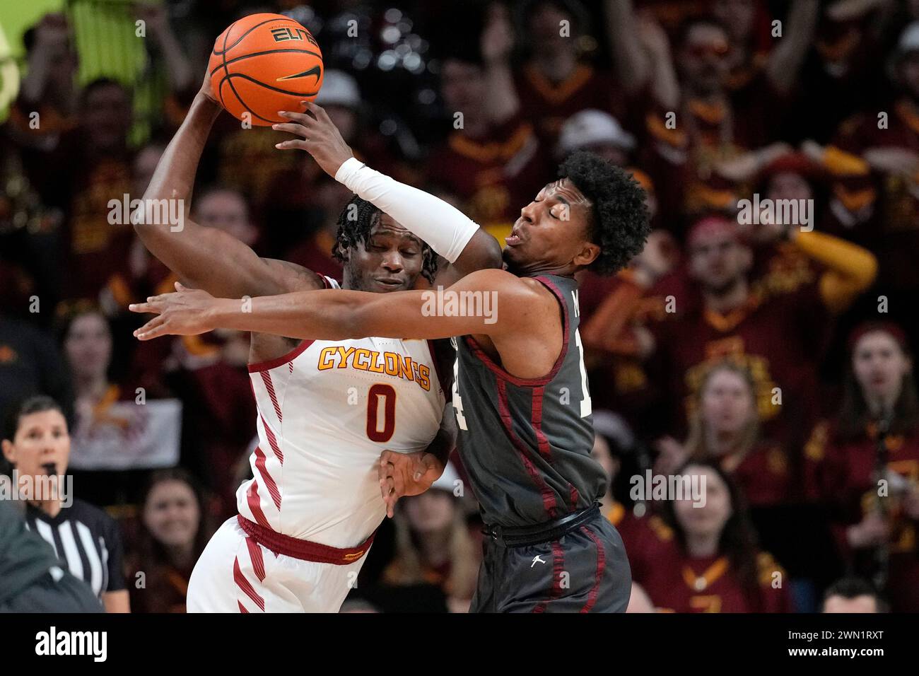 Iowa State forward Tre King (0) looks to pass Oklahoma forward Jalon ...