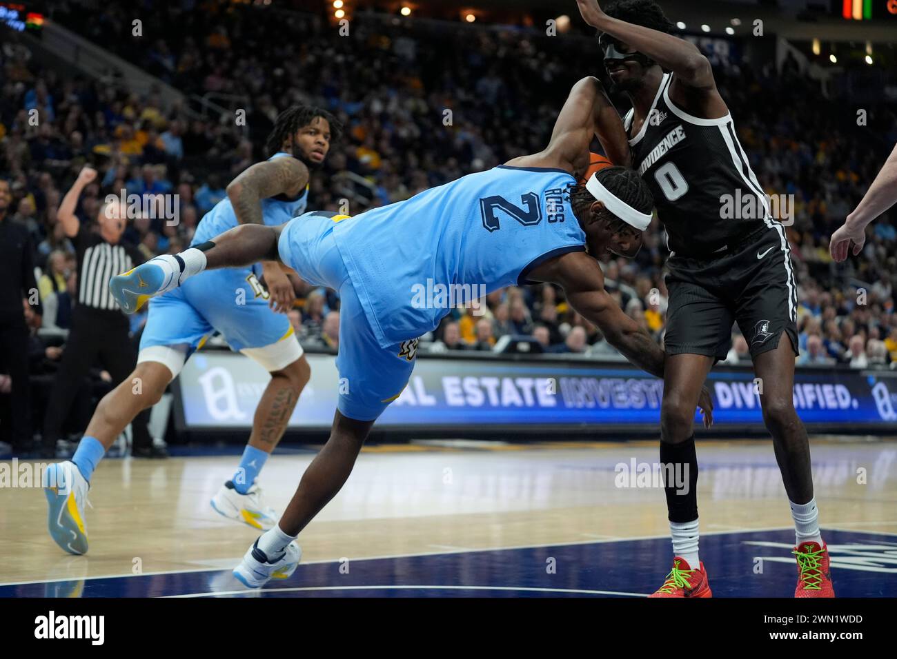 Providence's Ticket Gaines fouls Marquette's Chase Ross during the ...