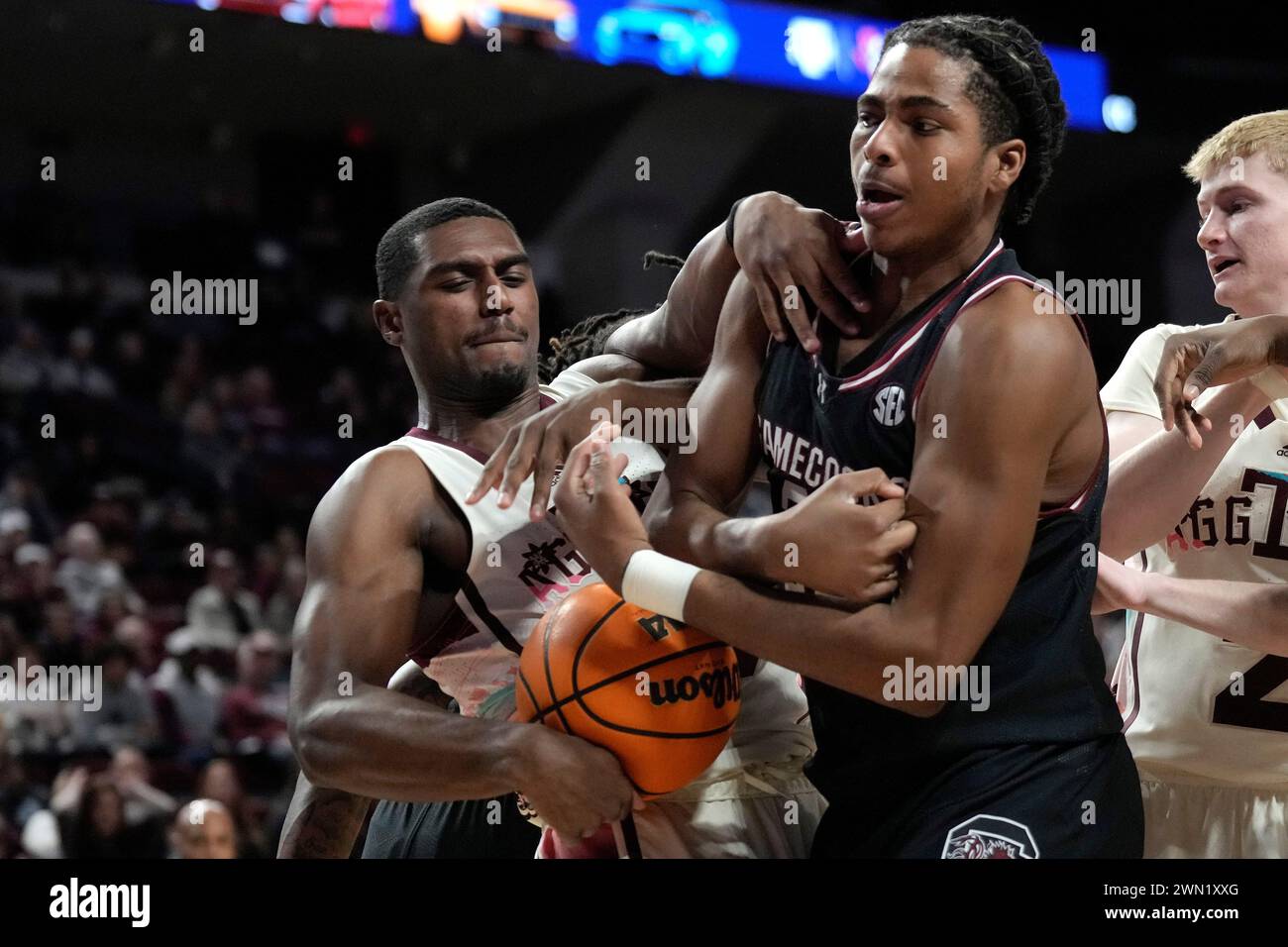 Texas A&M forward Henry Coleman III, left, and South Carolina forward ...