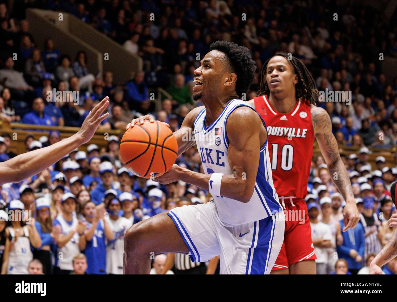 Duke's Jeremy Roach (3) drives past Louisville's Kaleb Glenn (10 ...