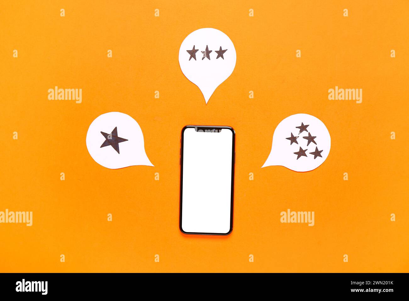 Speech bubbles with rating stars and mobile phone on orange background ...