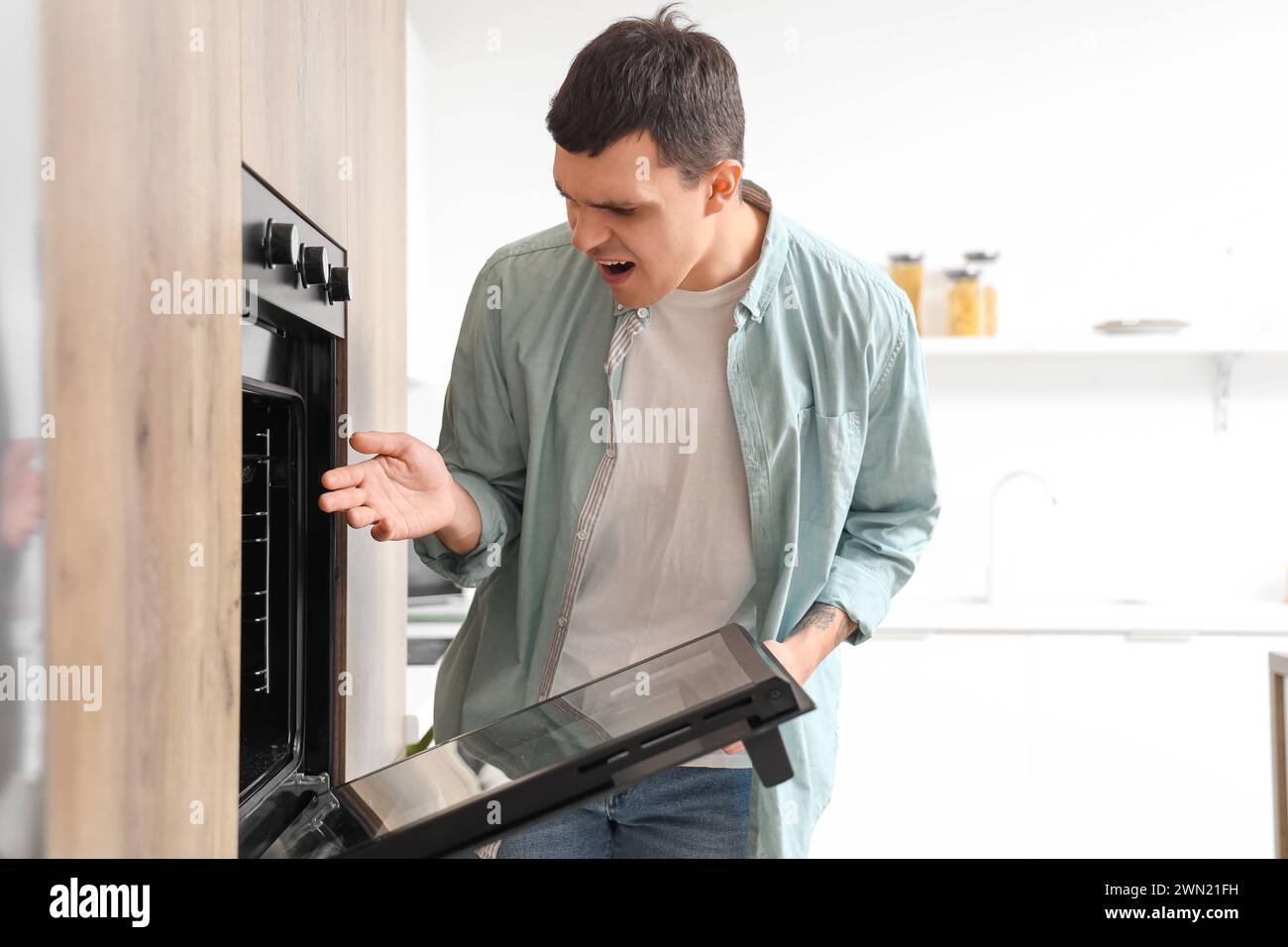 Man domestic accident burn hi-res stock photography and images - Alamy