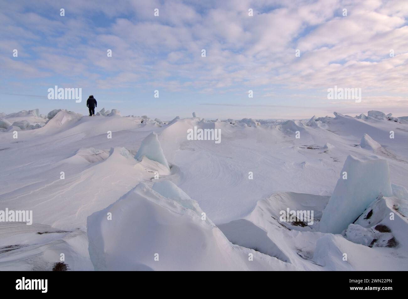 person on pressure ridge beach and very little shorefast ice before an ...