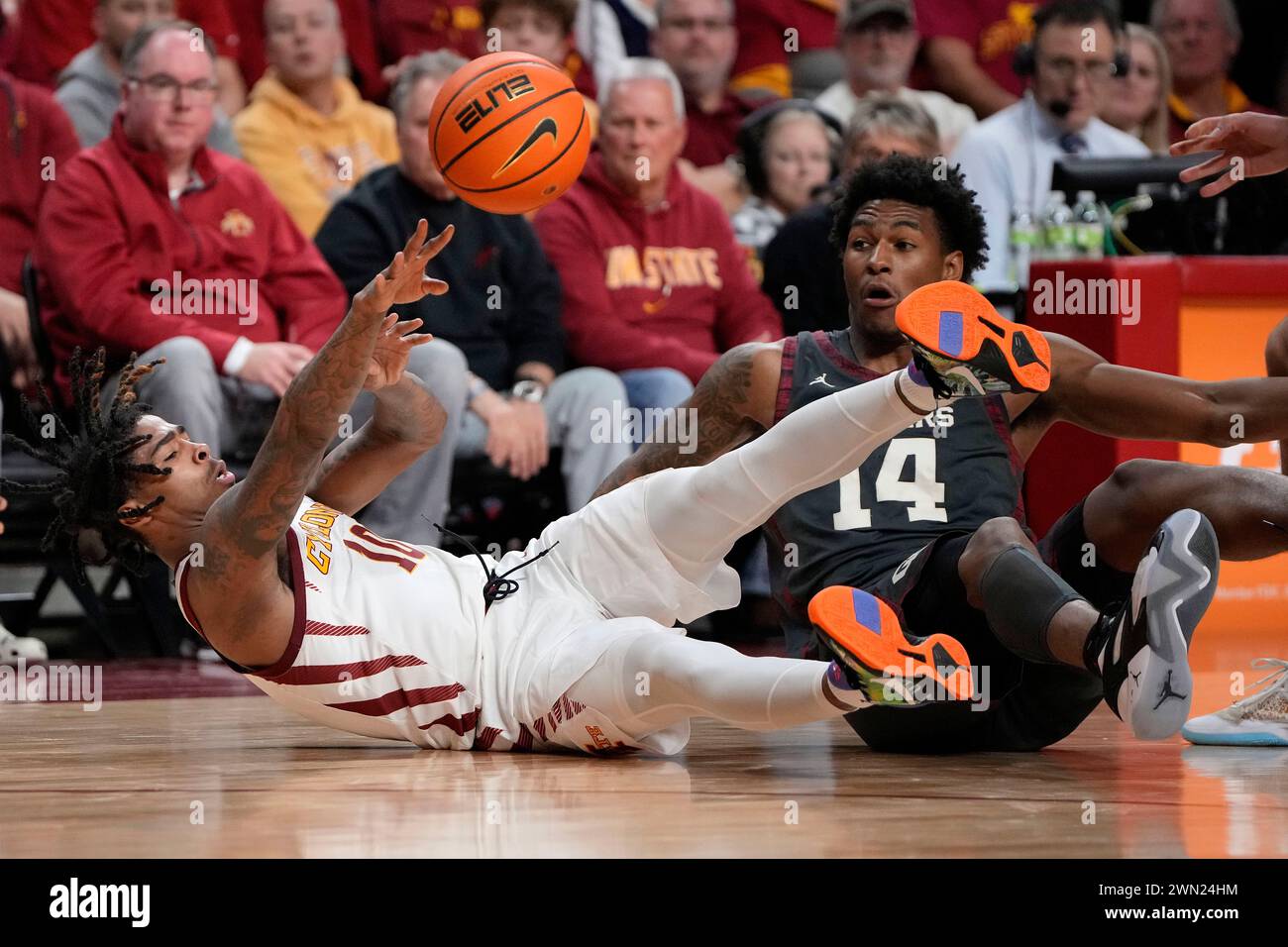 Iowa State guard Keshon Gilbert (10) scrambles to pass the ball from ...