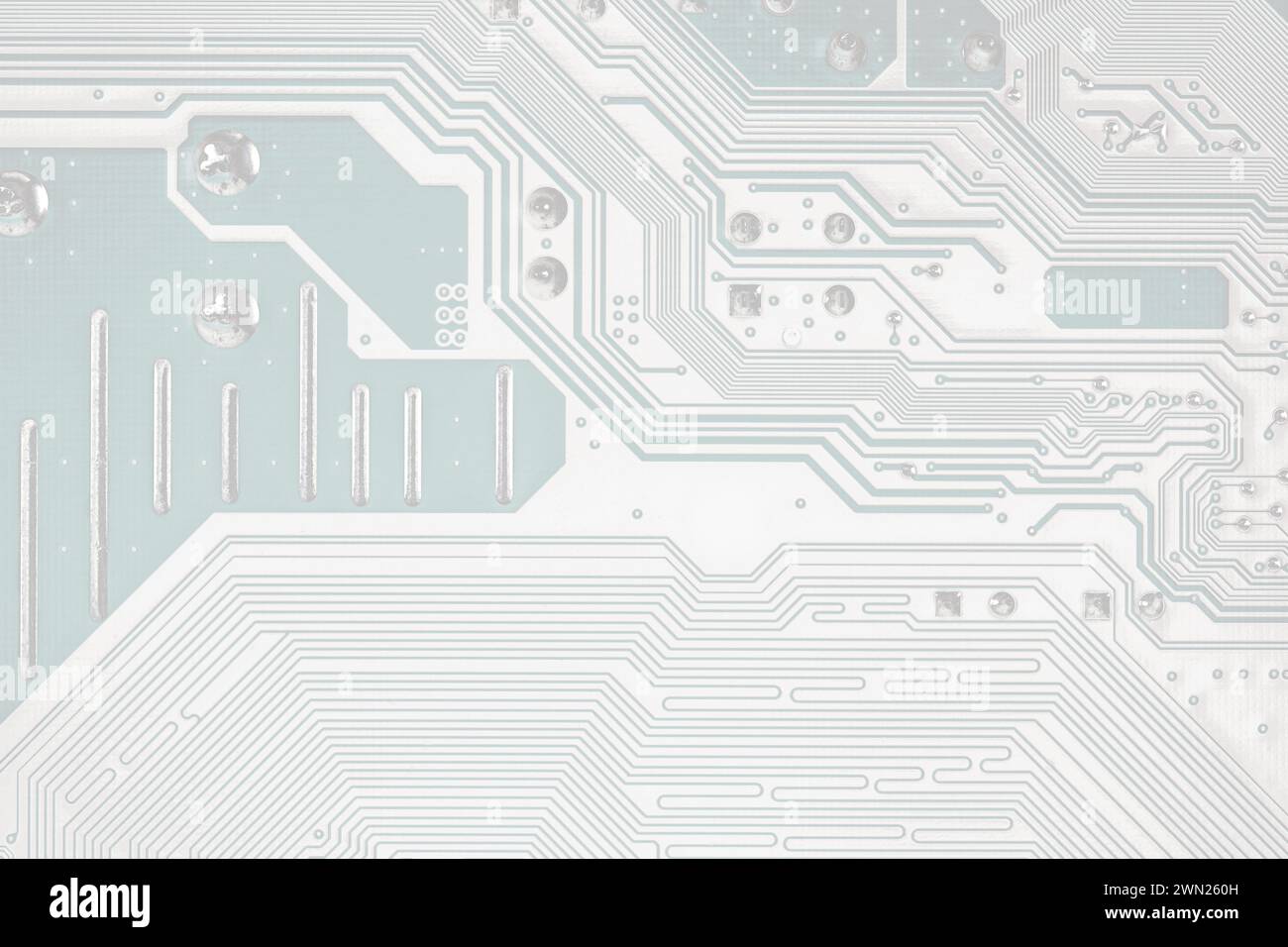 back side of computer mainboard. electrical connections of circuit ...