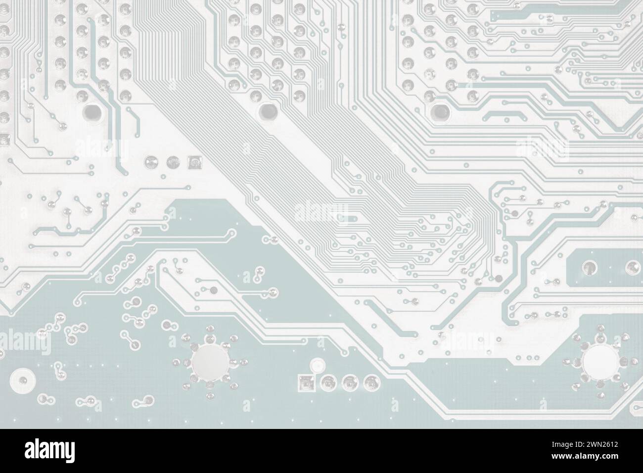 back side of computer mainboard. electrical connections of circuit board. details extreme ...