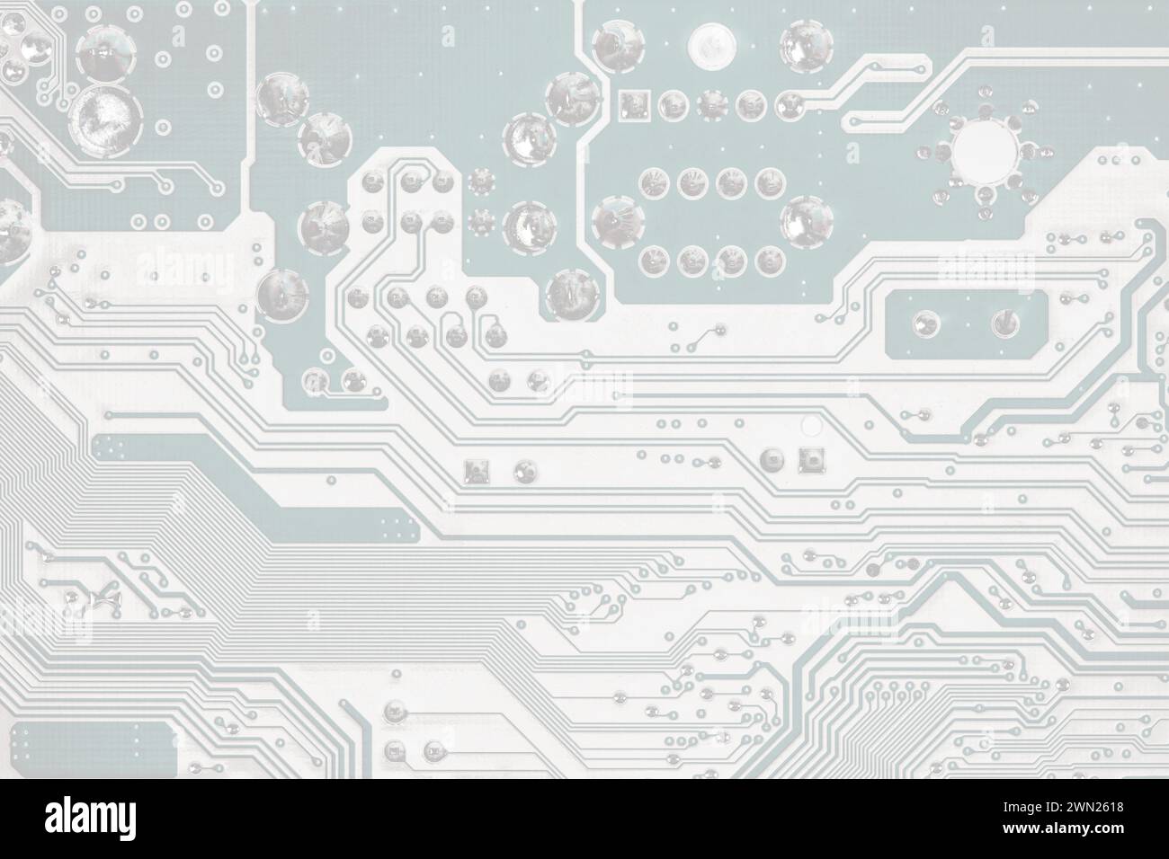 back side of computer mainboard. electrical connections of circuit ...