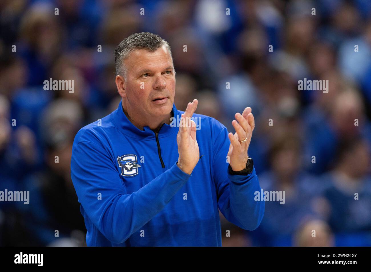Creighton head coach Greg McDermott applauds his team as they play ...