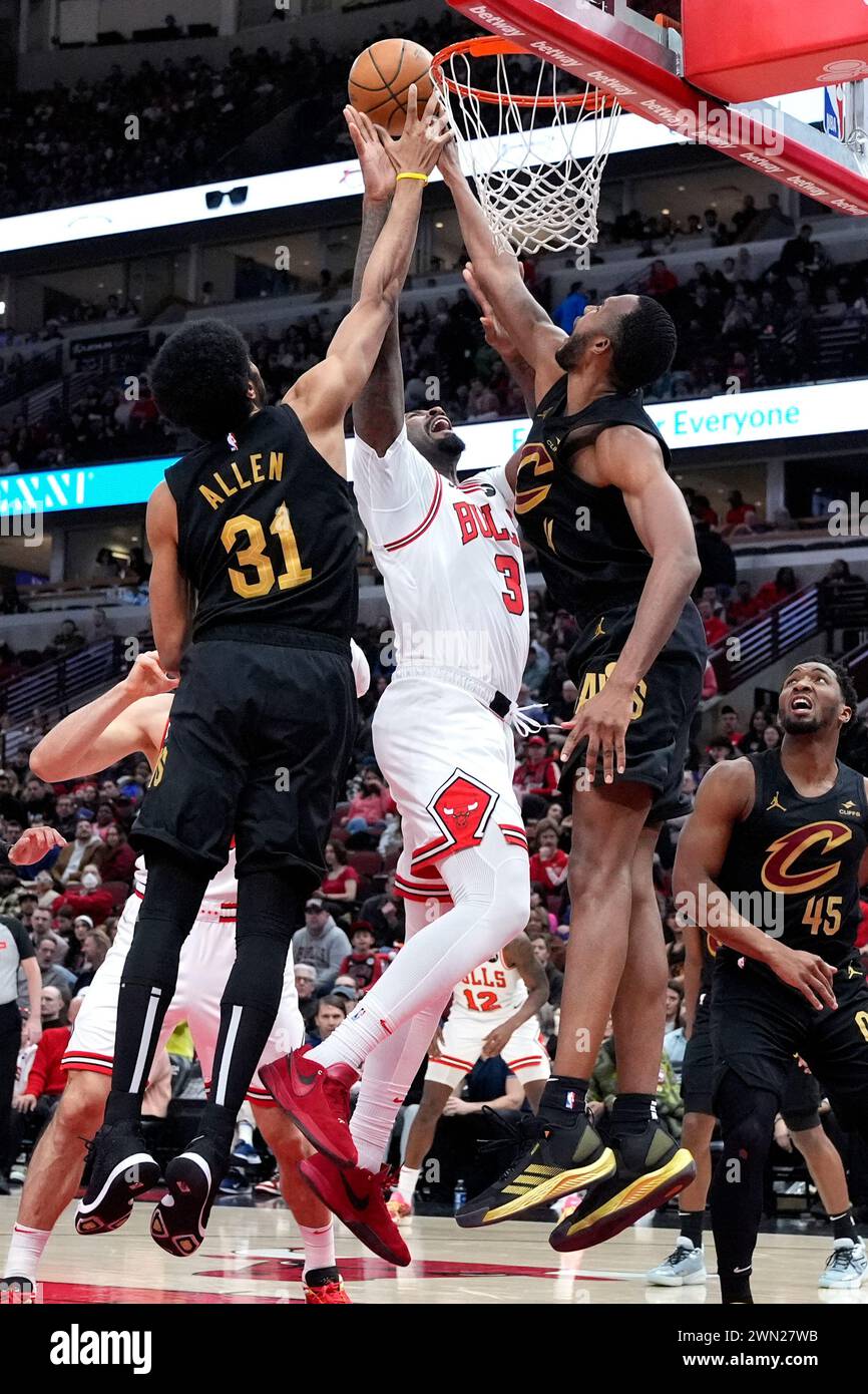 Chicago Bulls center Andre Drummond, center, shoots against Cleveland ...