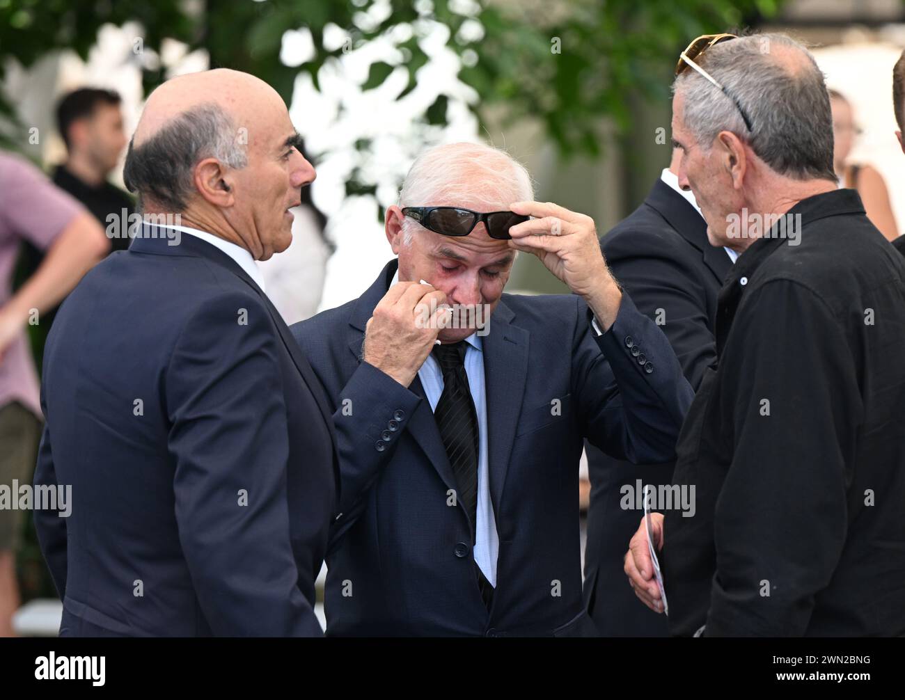 Brisbane, Australia. 29th Feb, 2024. Victor White (centre) husband of ...