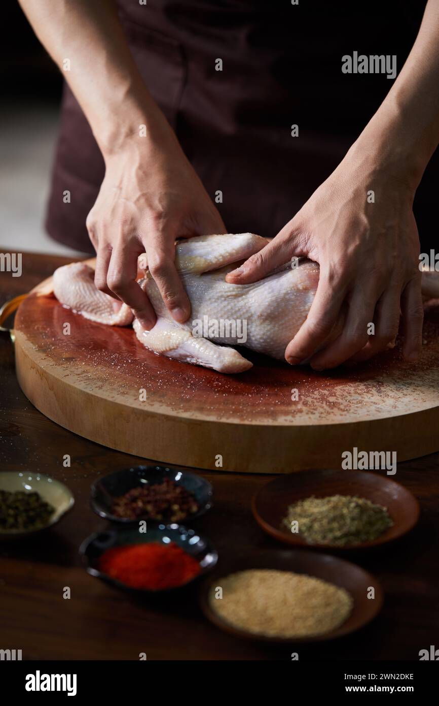 Cook making dishes in the kitchen Stock Photo - Alamy