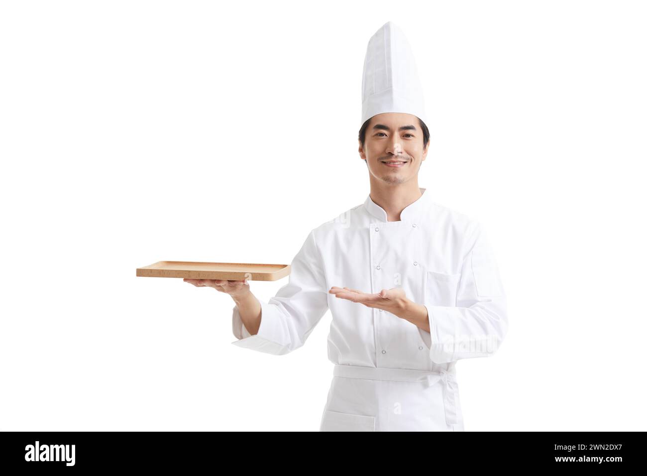 Cook making dishes in the kitchen Stock Photo - Alamy