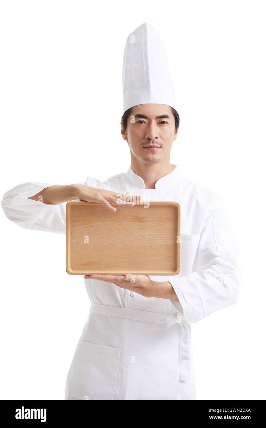 Cook making dishes in the kitchen Stock Photo - Alamy