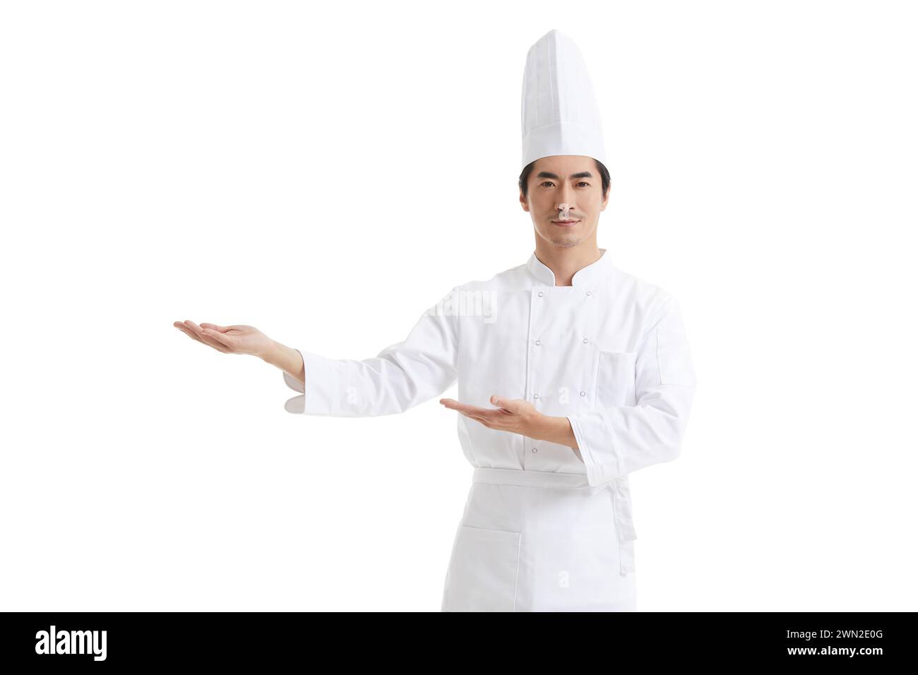 Chef making introducing gesture Stock Photo - Alamy