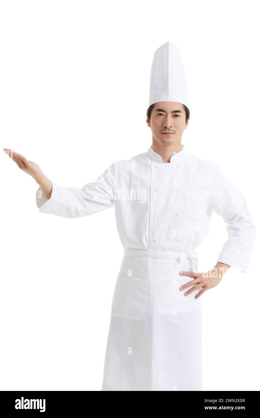 Chef making introducing gesture Stock Photo - Alamy