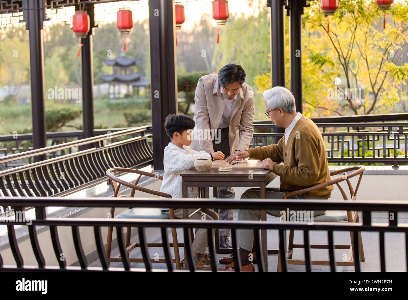 Indian family members sitting hi-res stock photography and images - Alamy
