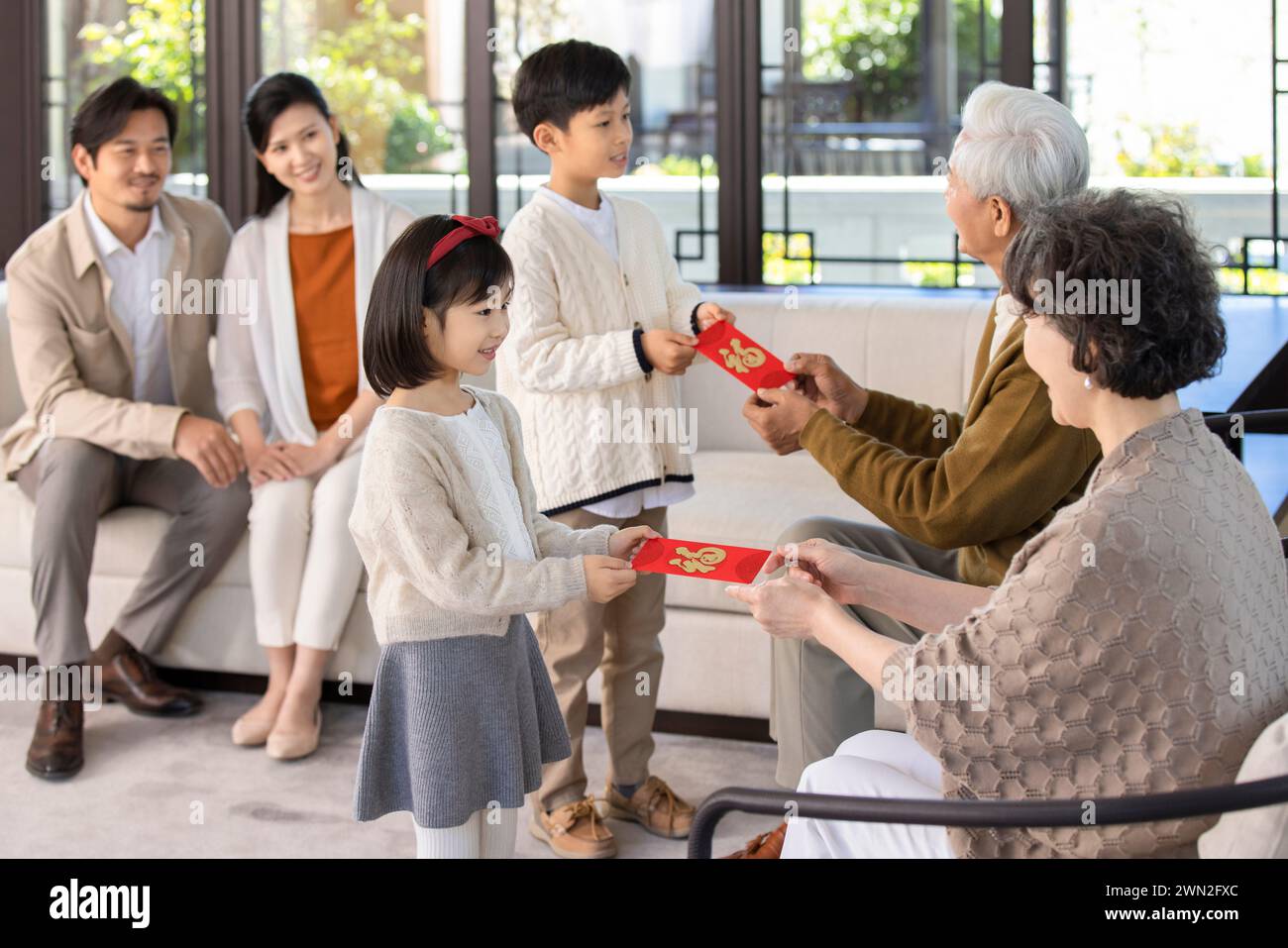 Visiting Family on Chinese New Year Stock Photo - Alamy