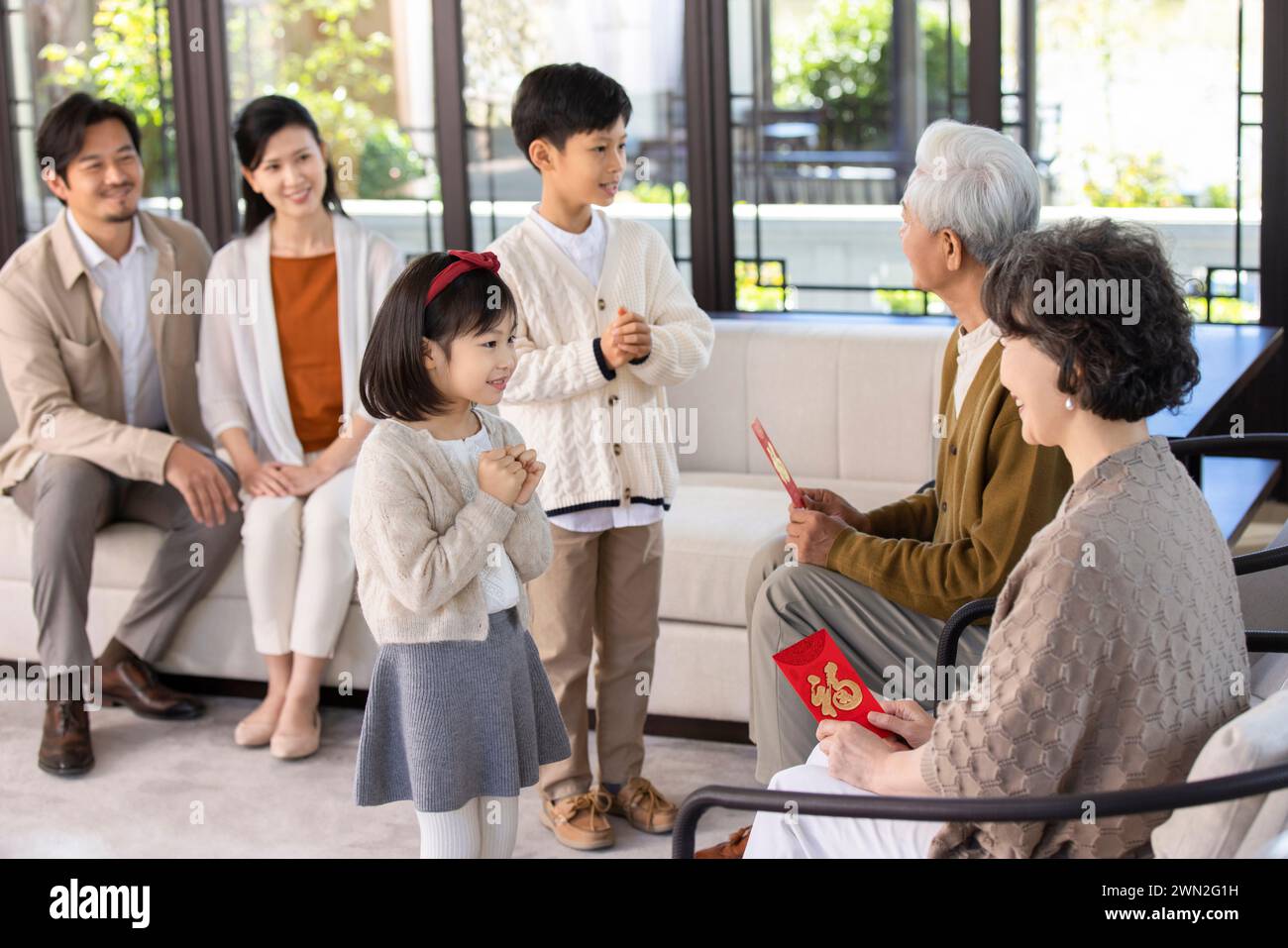 Visiting Family on Chinese New Year Stock Photo - Alamy