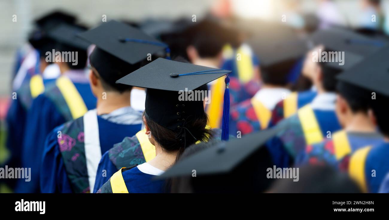 Back view of graduates during commencement Stock Photo - Alamy