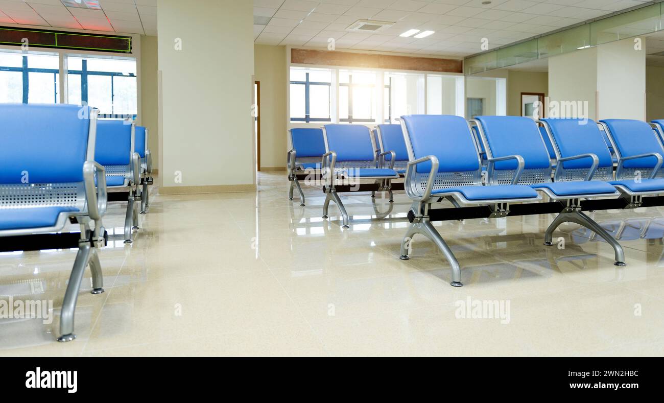 Hospital waiting room with row of empty chairs Stock Photo - Alamy
