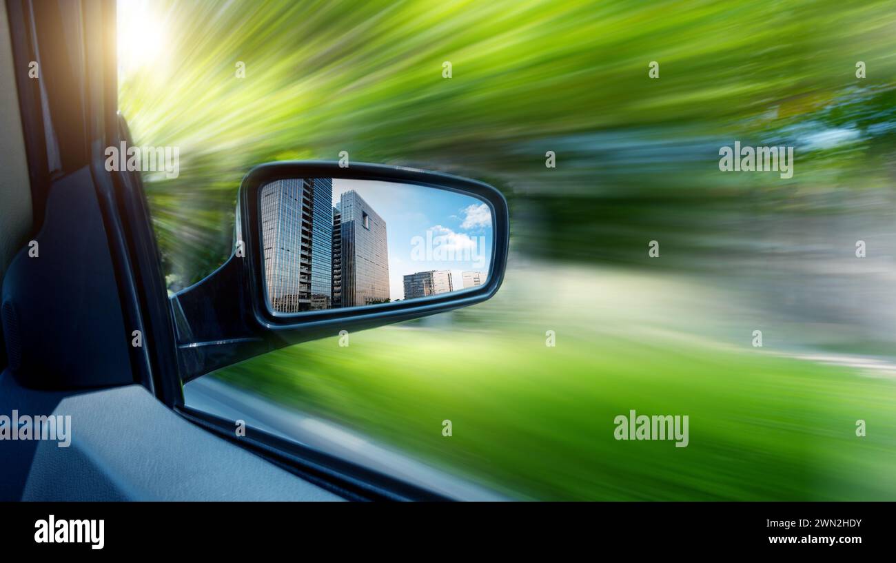 Car driving fast escape city into forest Stock Photo - Alamy
