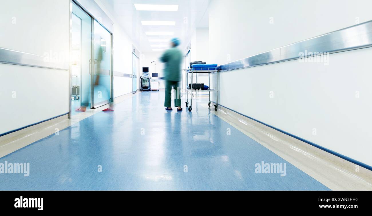 Doctors and nurses walking in the hospital hallway Stock Photo - Alamy