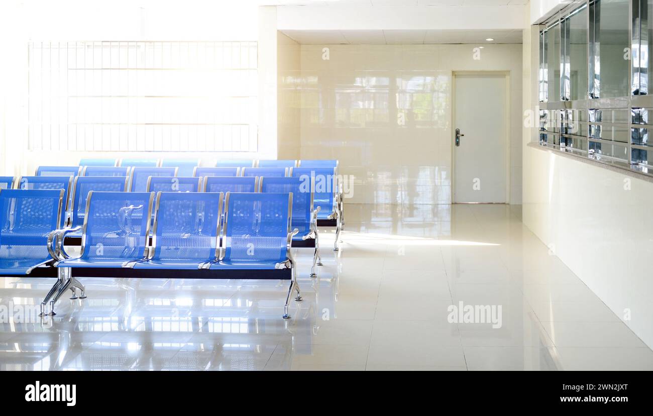 Hospital waiting room with low of empty chairs Stock Photo - Alamy