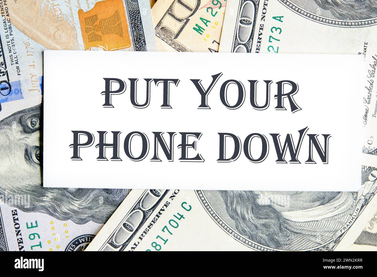 Put Your Phone Down text written on a white card against the background ...