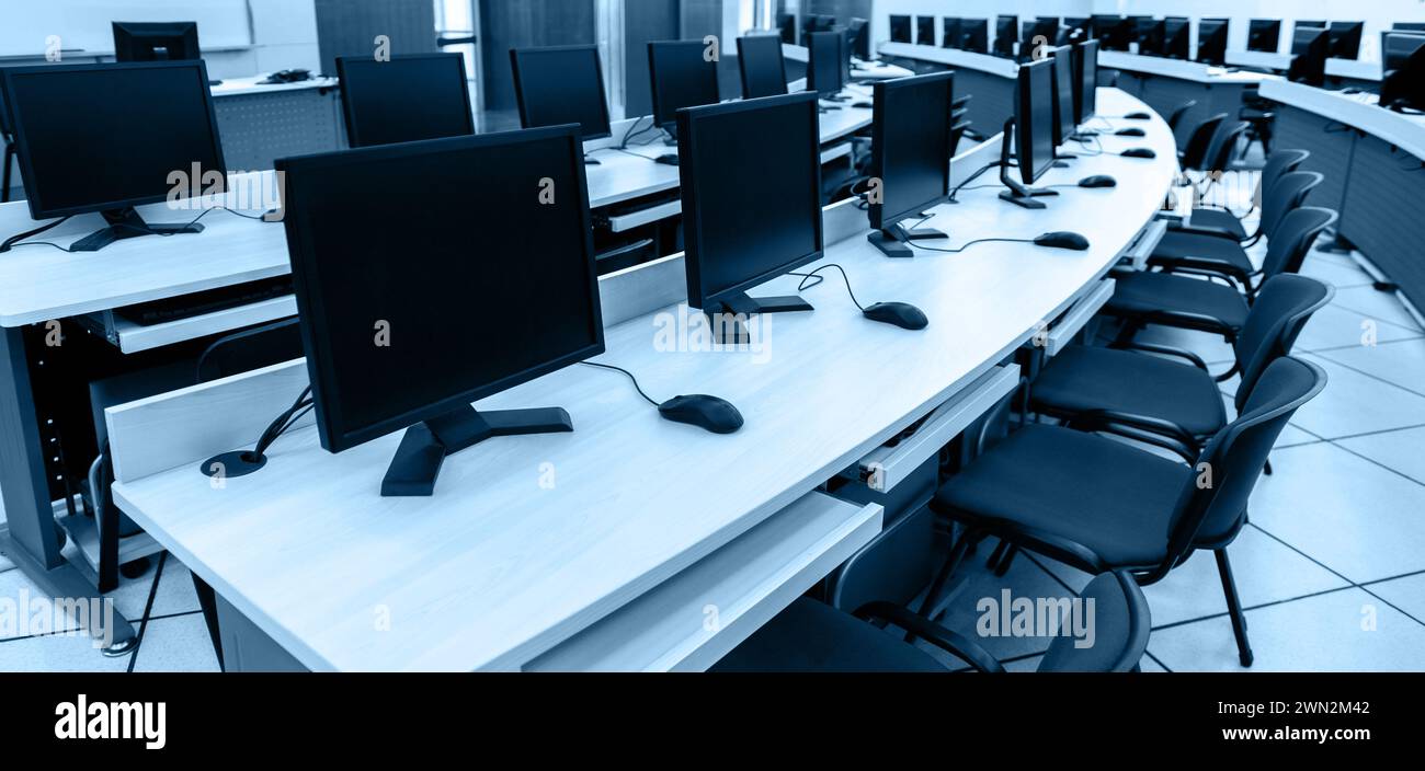 Group desks computer monitors hi-res stock photography and images - Alamy