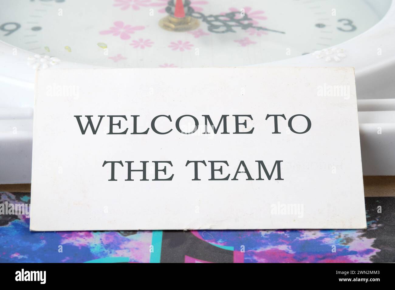 WELCOME TO THE TEAM text written on a white business card Stock Photo ...
