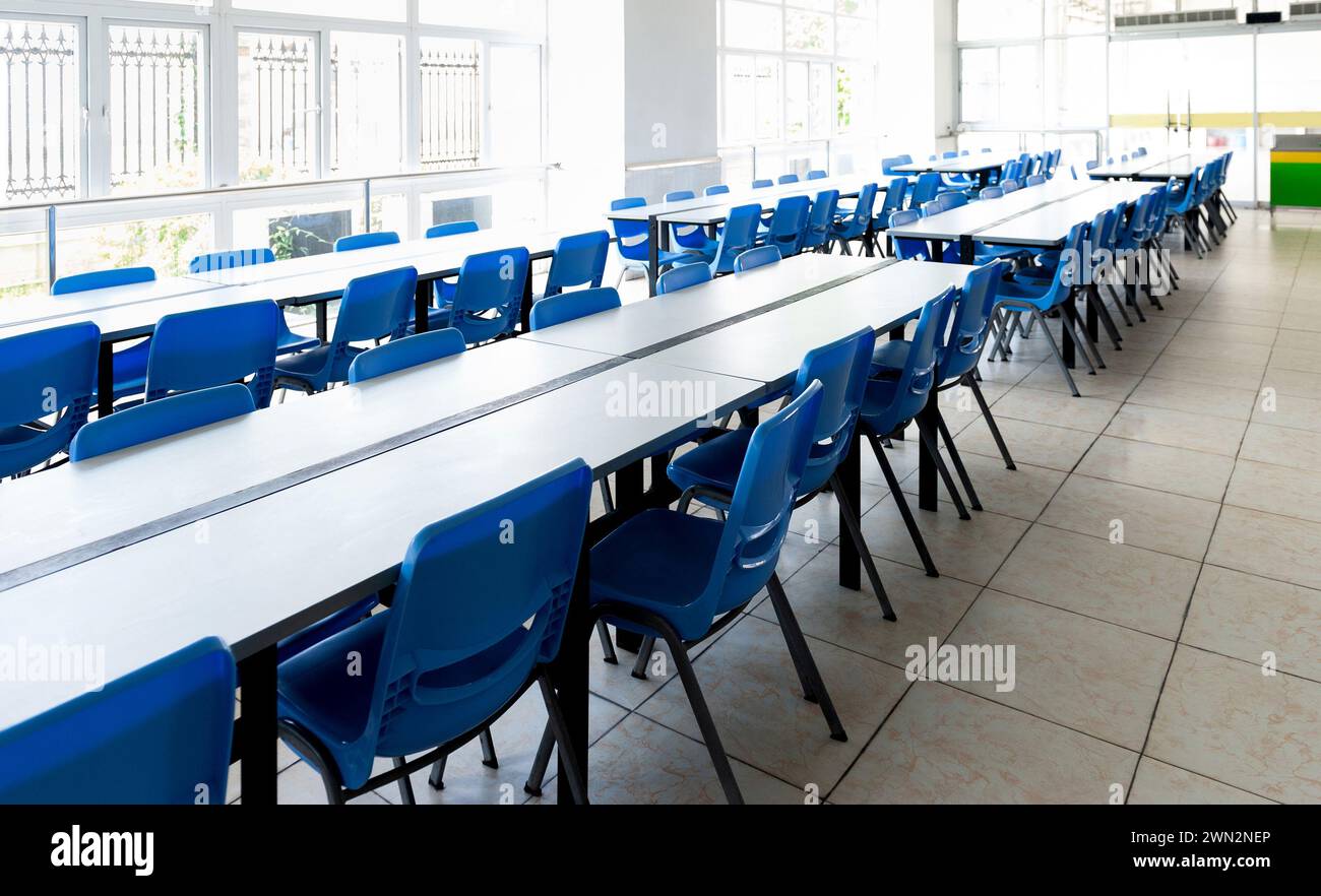 Clean school cafeteria with empty seats and tables Stock Photo - Alamy