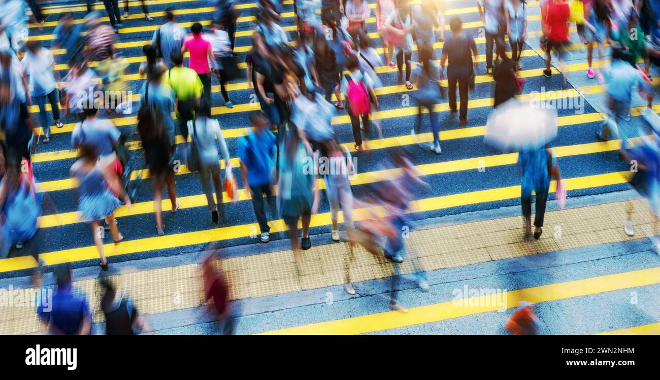 Busy people on zebra crossing street in Hong Kong, China Stock Photo ...