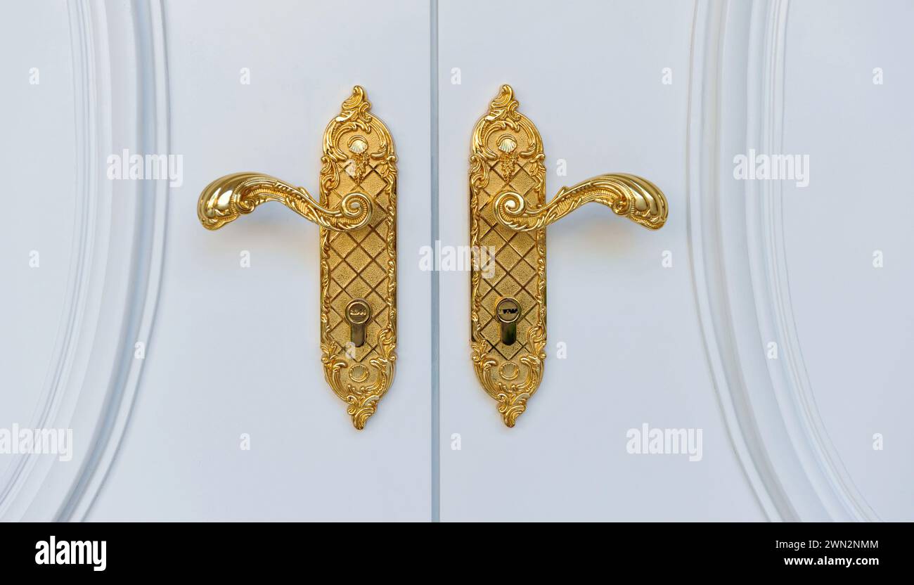 White door golden handle hi-res stock photography and images - Alamy