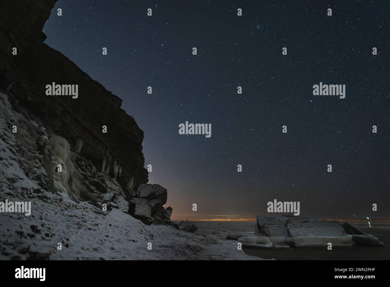 Night, view of the Paldiski sea cliff and the starry sky. Low light ...