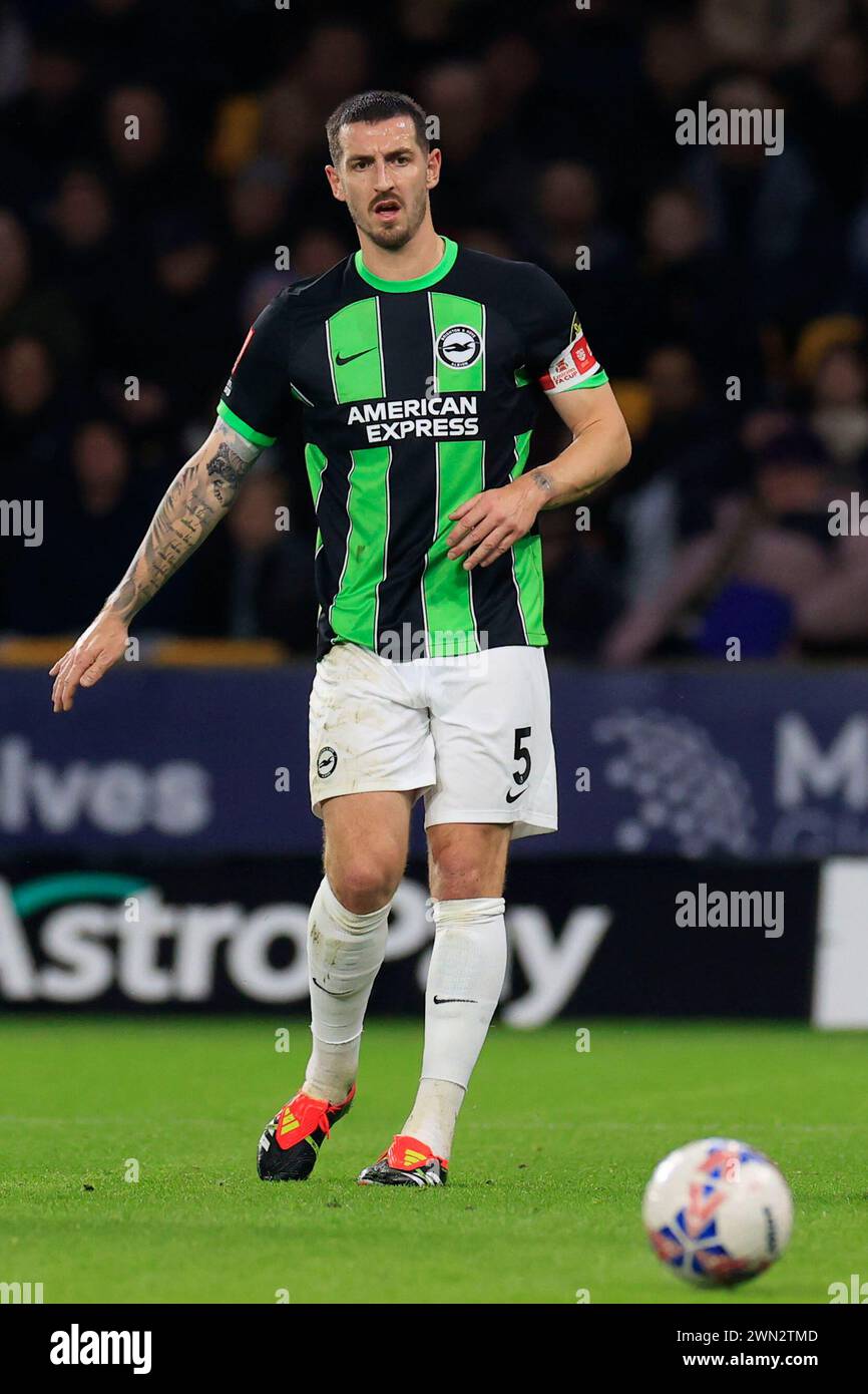 Wolverhampton, UK. 28th Feb, 2024. Lewis Dunk of Brighton & Hove Albion ...