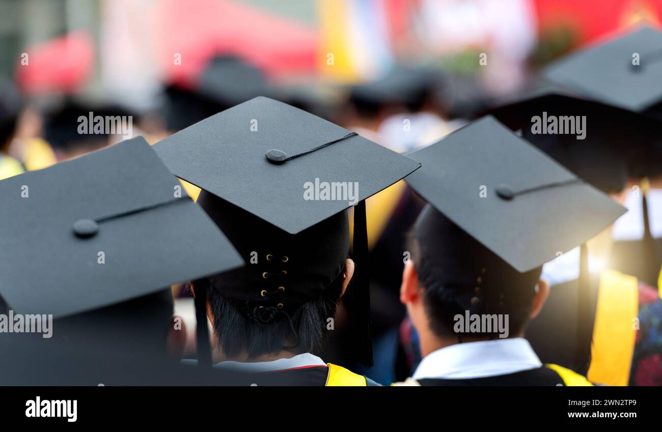 Back of graduates during commencement Stock Photo - Alamy