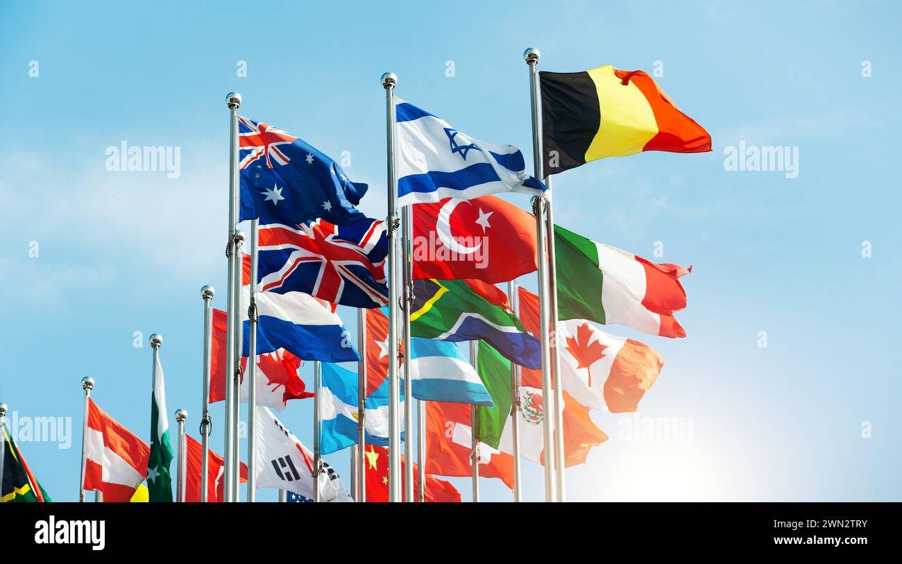 Set of flags fluttering in the wind against blue sky background Stock ...