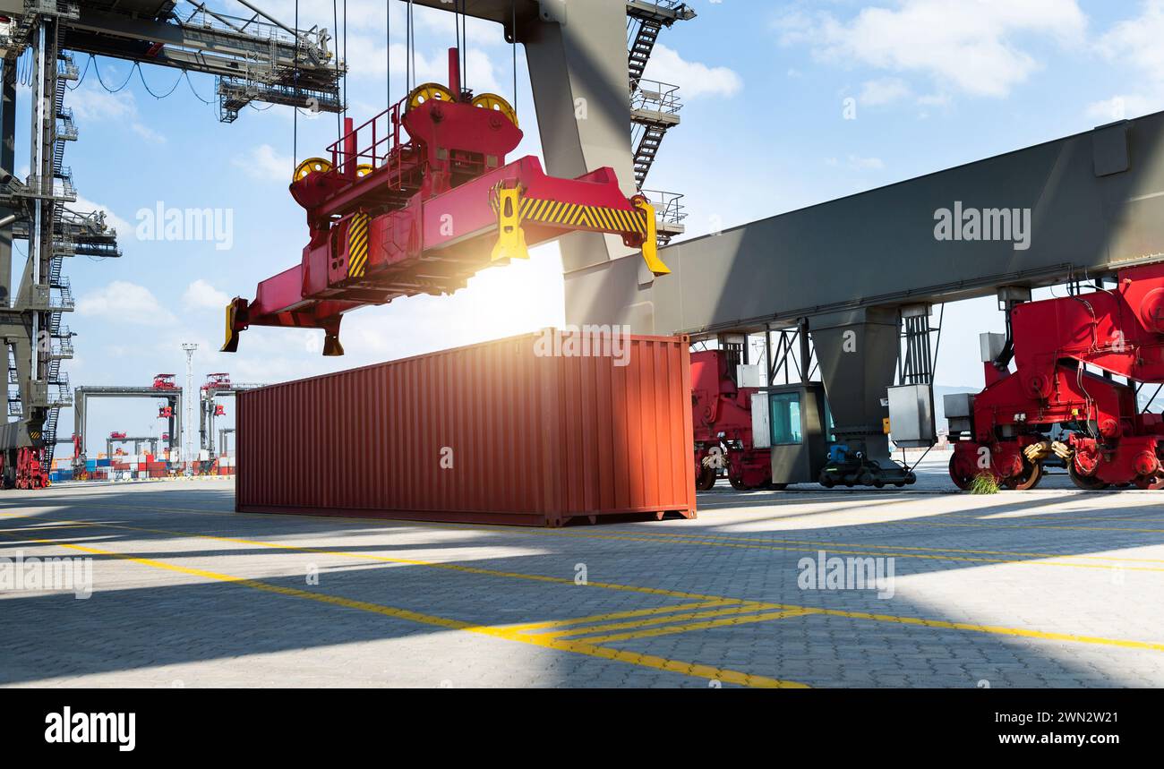 Crane unloading container in the port Stock Photo - Alamy