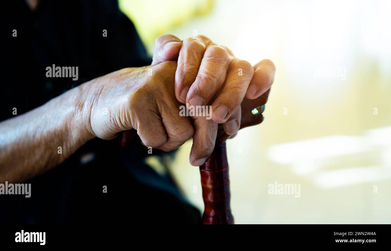 Old chinese man walking stick hi-res stock photography and images - Alamy