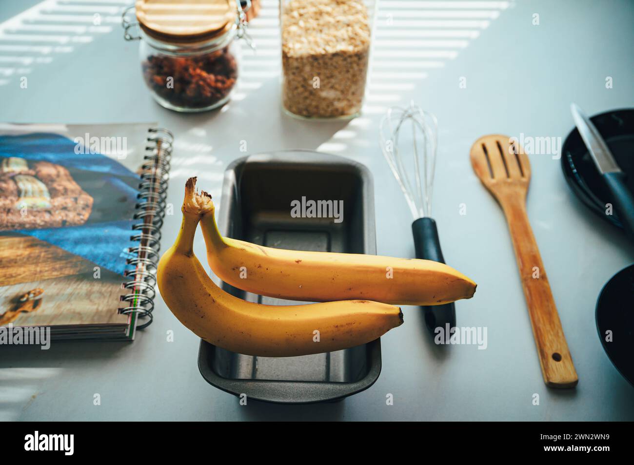 Baking essentials on a kitchen counter: Ingredients for perfect banana ...