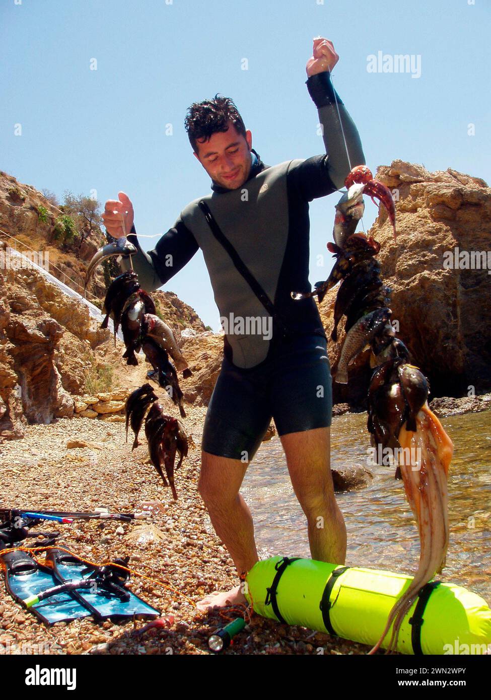 fishing with fishing rod at the sea, outdoor activity at the water ...