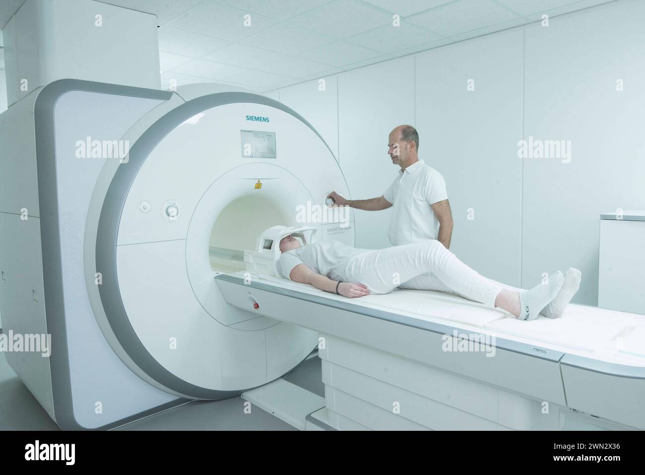 magnetic resonance tomography and computer tomography, examination in ...