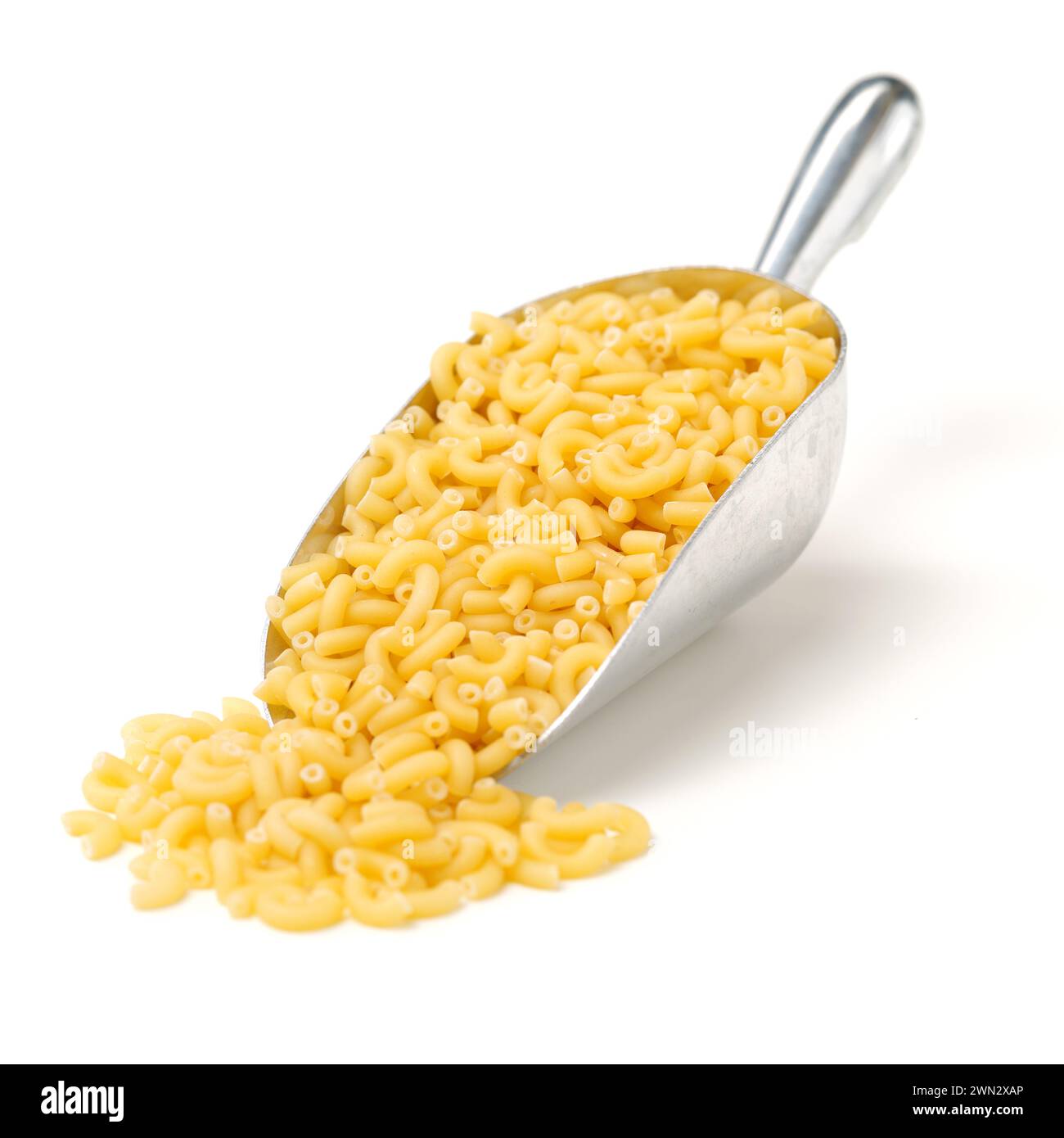 Italian pasta (Gomiti Rigati) on white background Stock Photo - Alamy