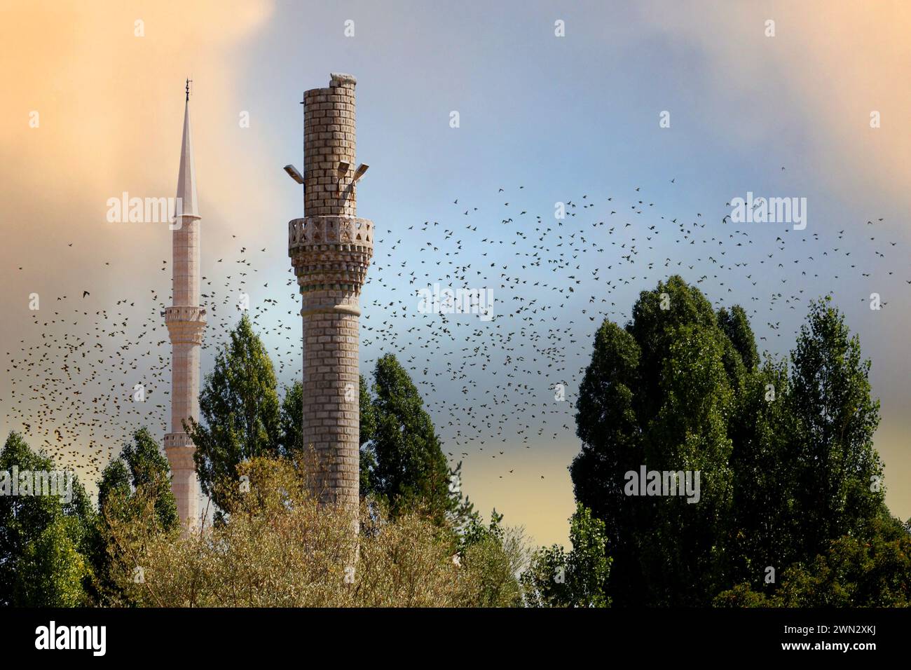 An old destroyed minaret and a solid minaret Stock Photo - Alamy