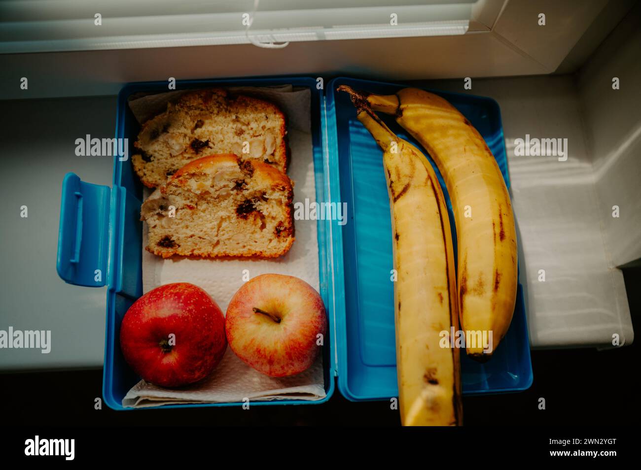 Breakfast packaging for school or work. Banana, apples and banana bread ...
