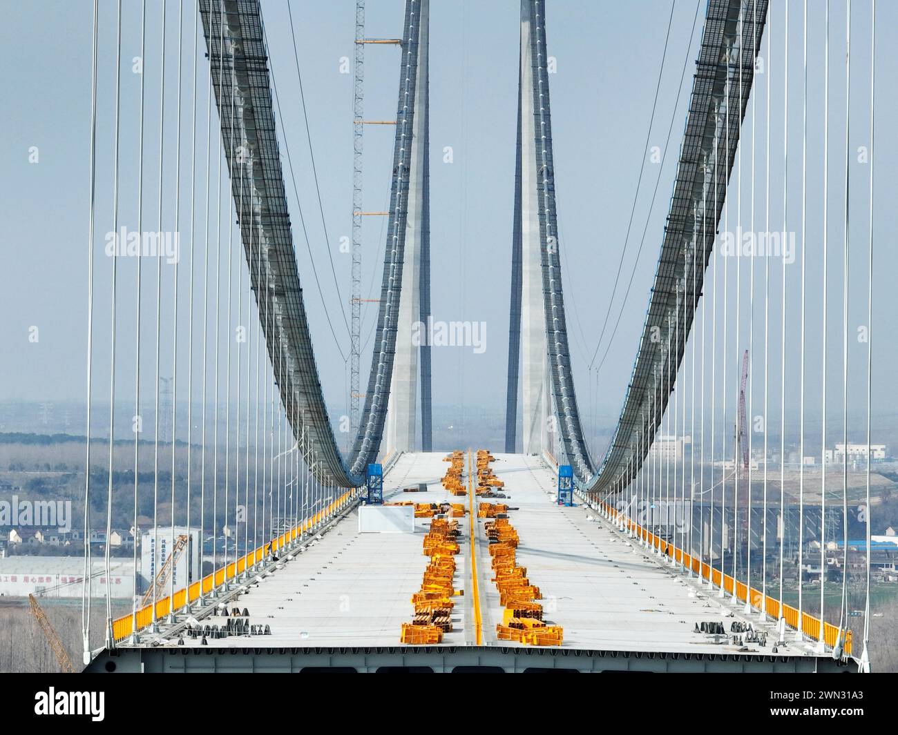 Aerial photo shows the Longtan Yangtze River Bridge under construction ...